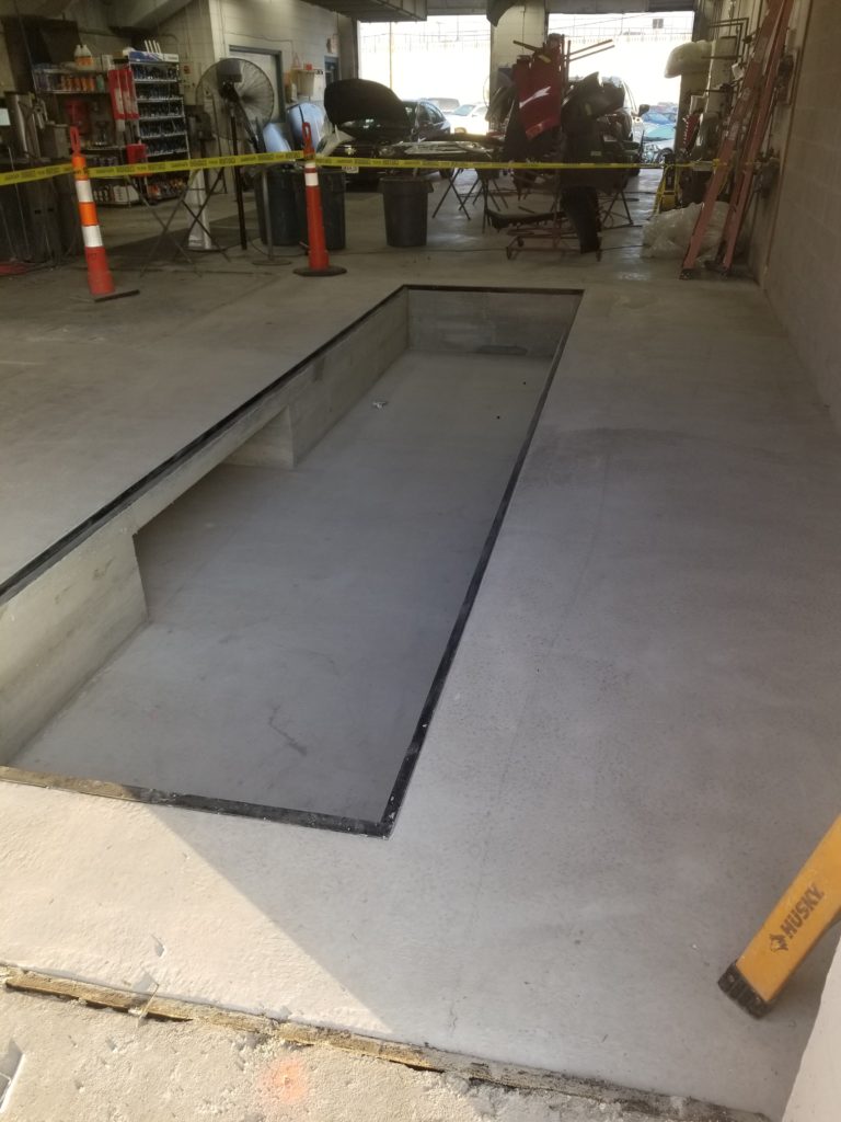 New Paint Booth Pit and Service Entrance Opening - Property Services ...